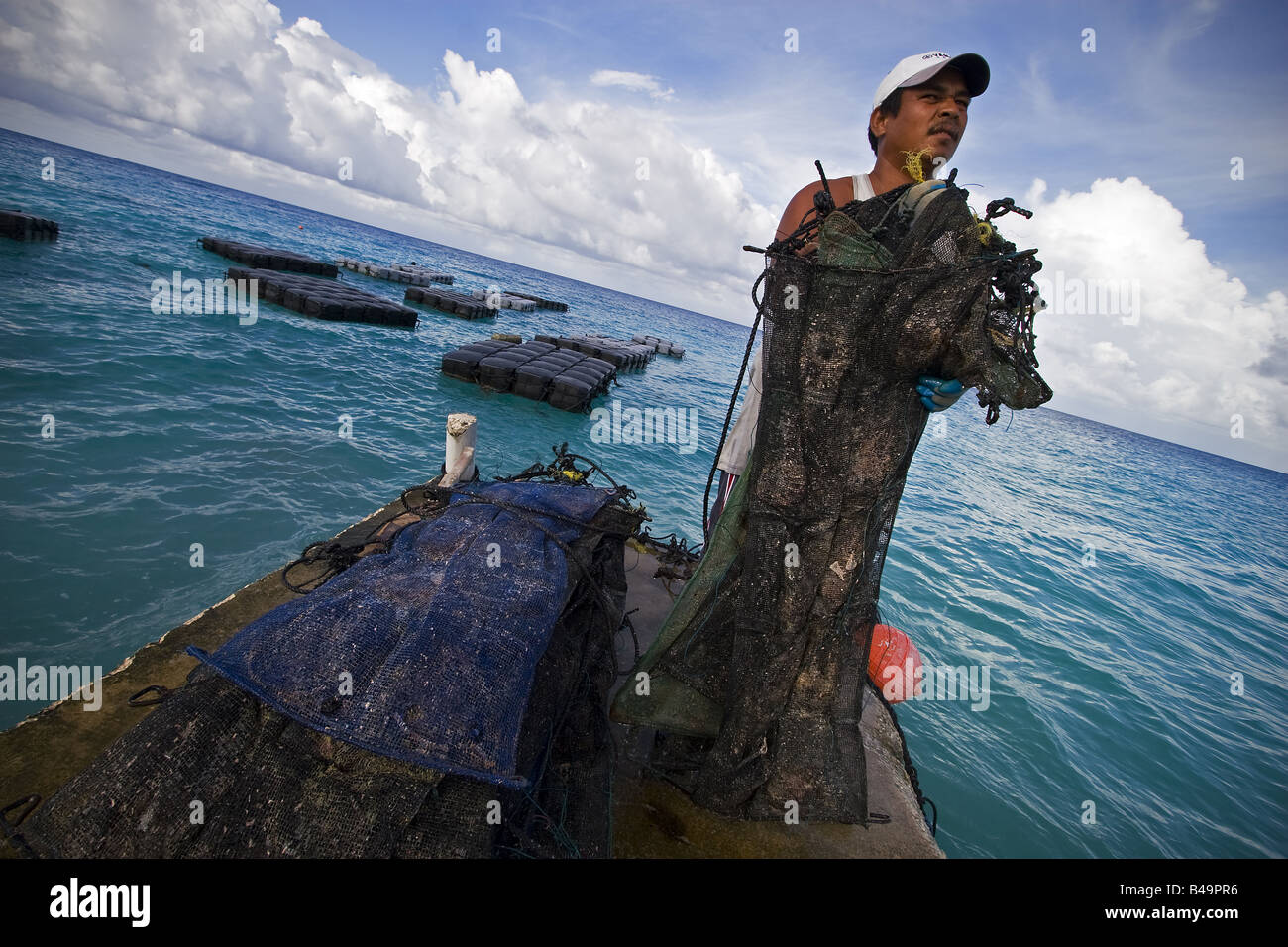 Pearl extraction Rangiroa French Polynesia Stock Photo - Alamy