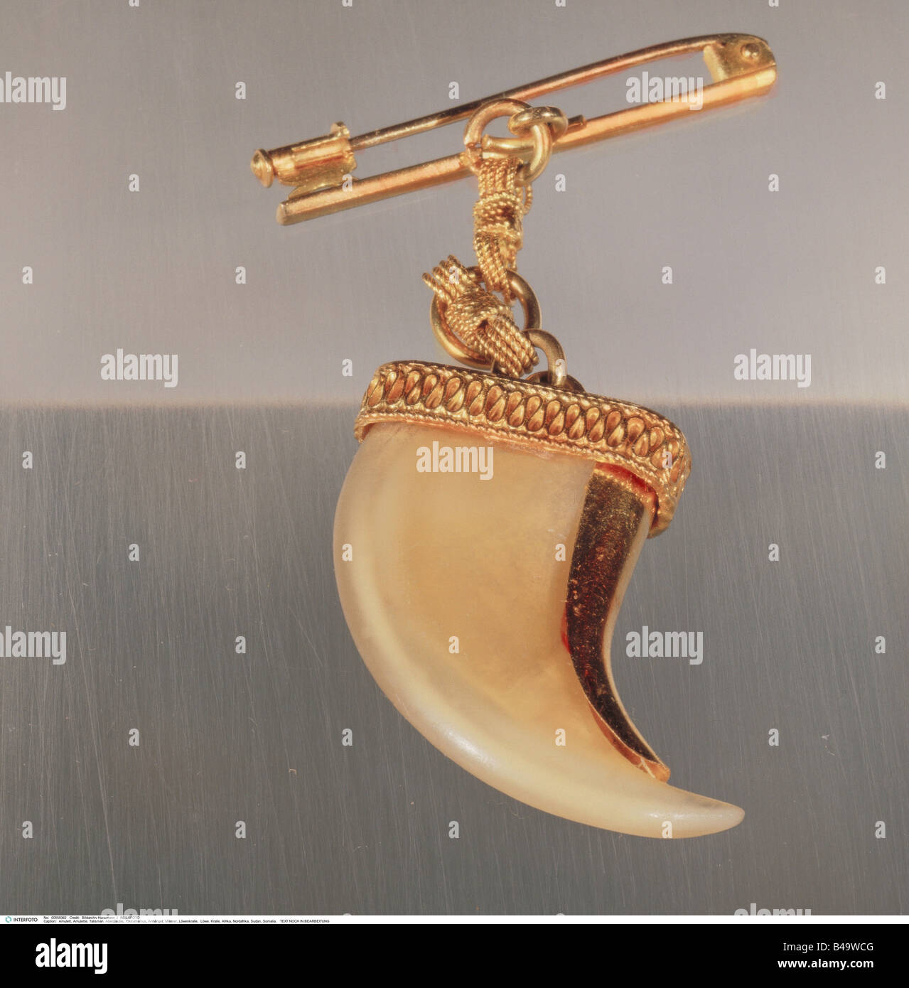 Golden amulet hi-res stock photography and images - Alamy