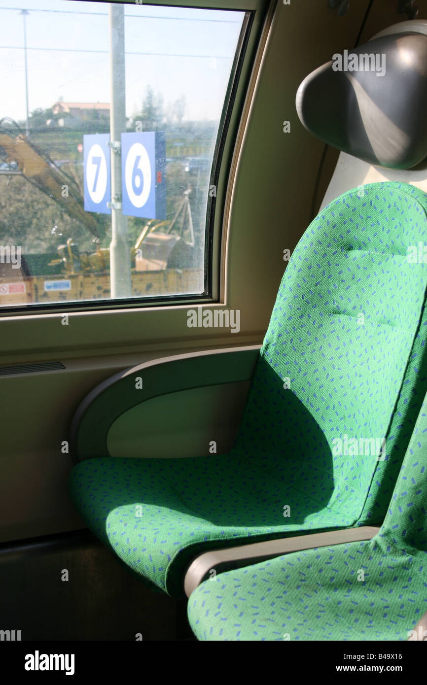 green seats in train carriage interior Stock Photo - Alamy