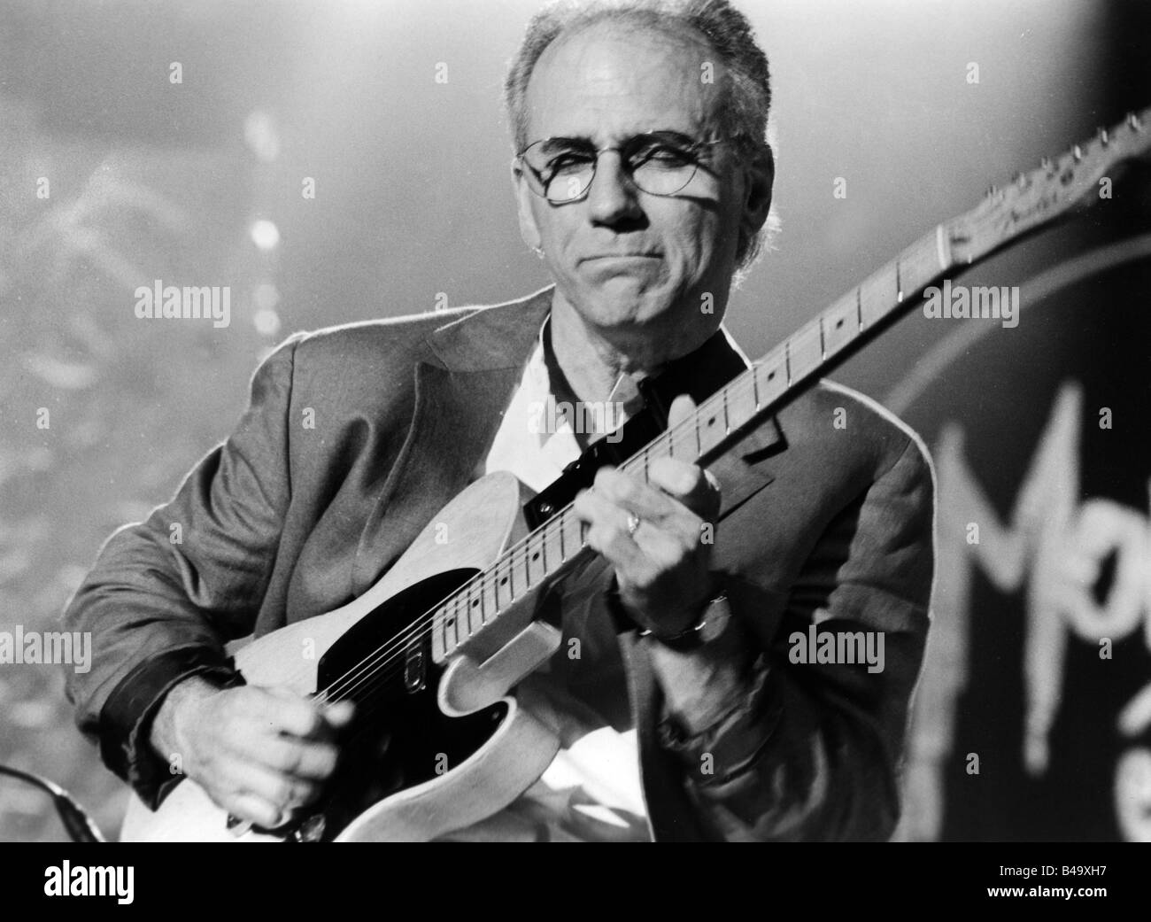 E playing hi-res stock photography and images - Alamy