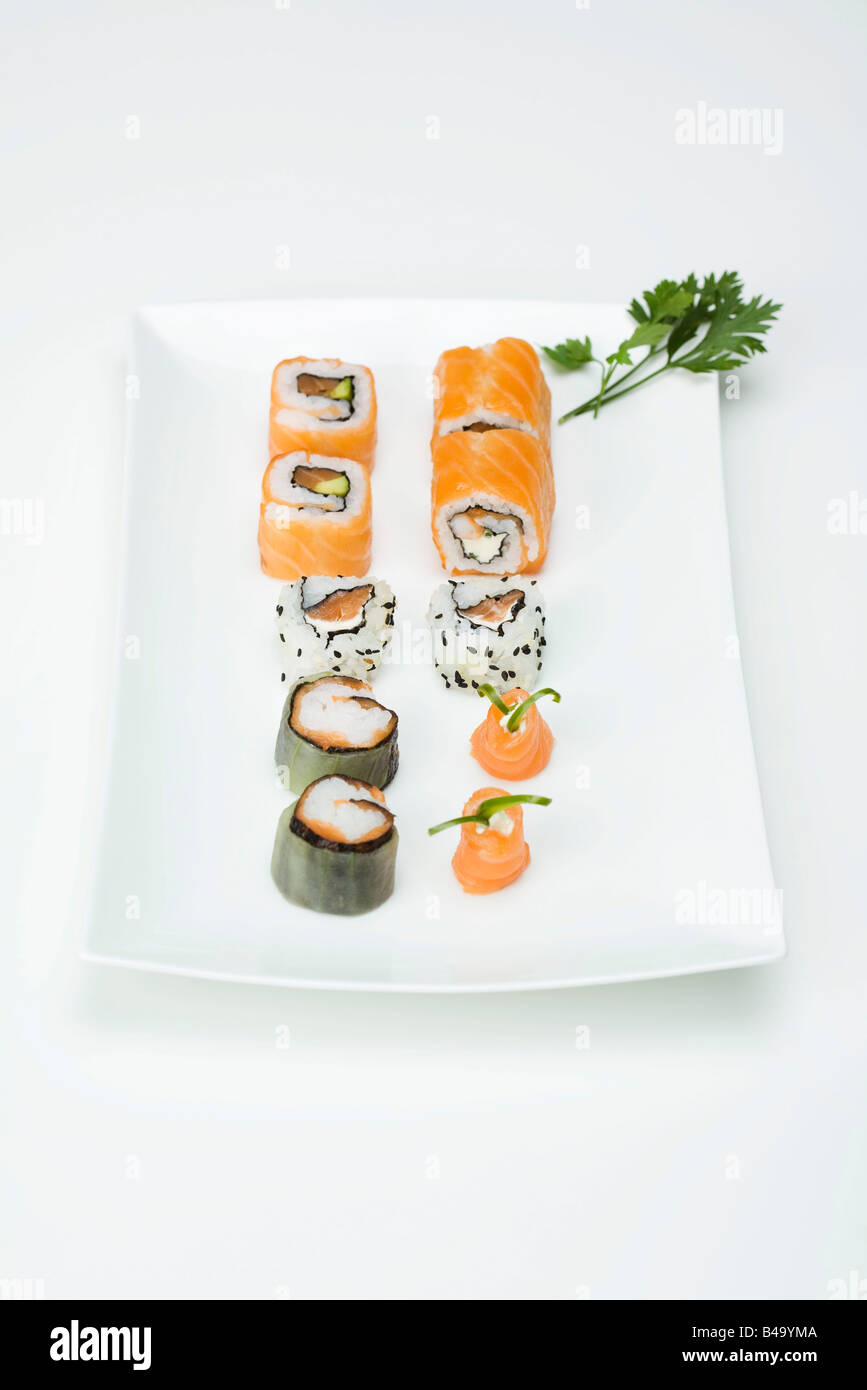 Assorted maki sushi arranged on sushi plate Stock Photo - Alamy