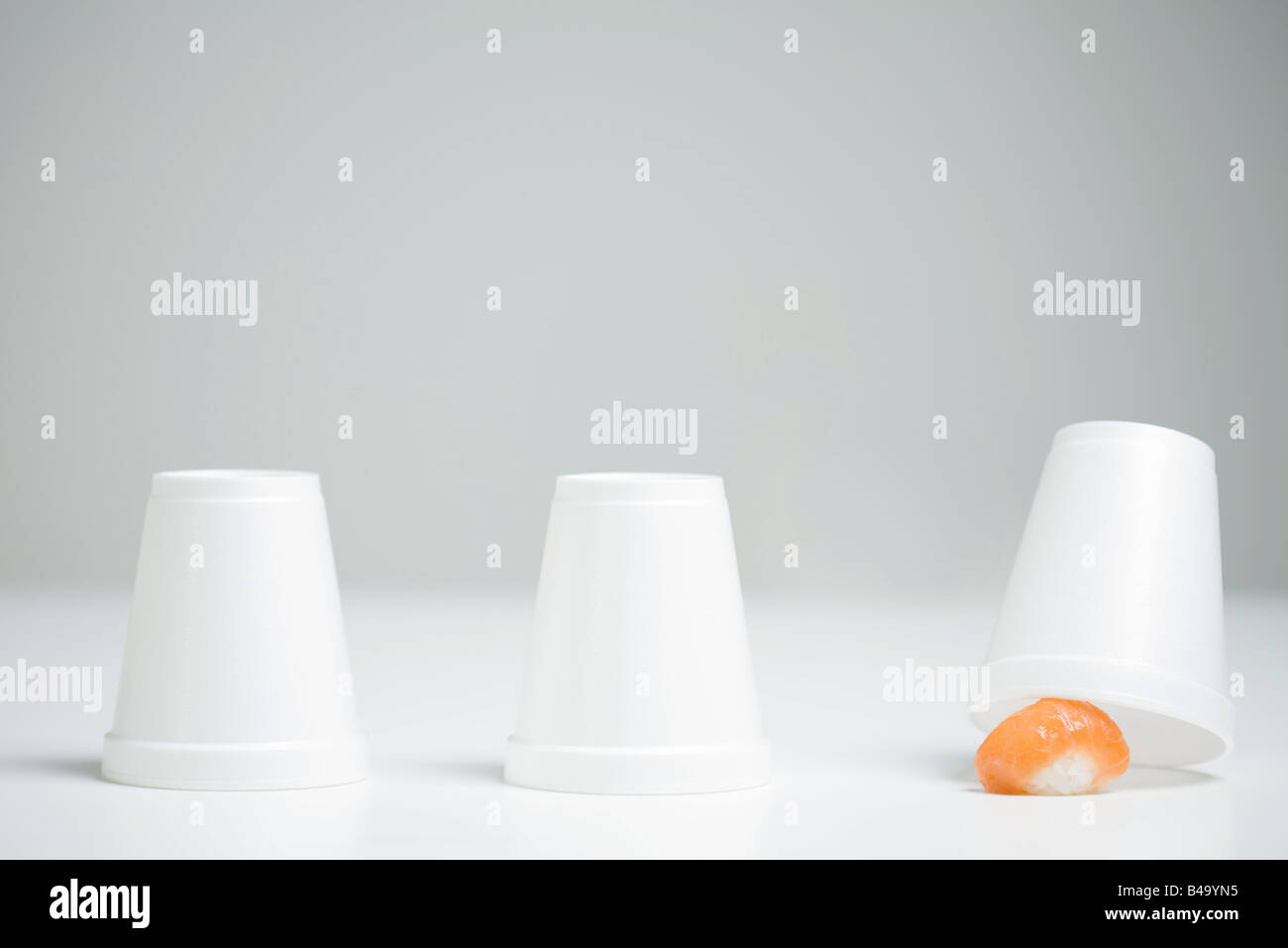 Cup upside down game hi-res stock photography and images - Alamy