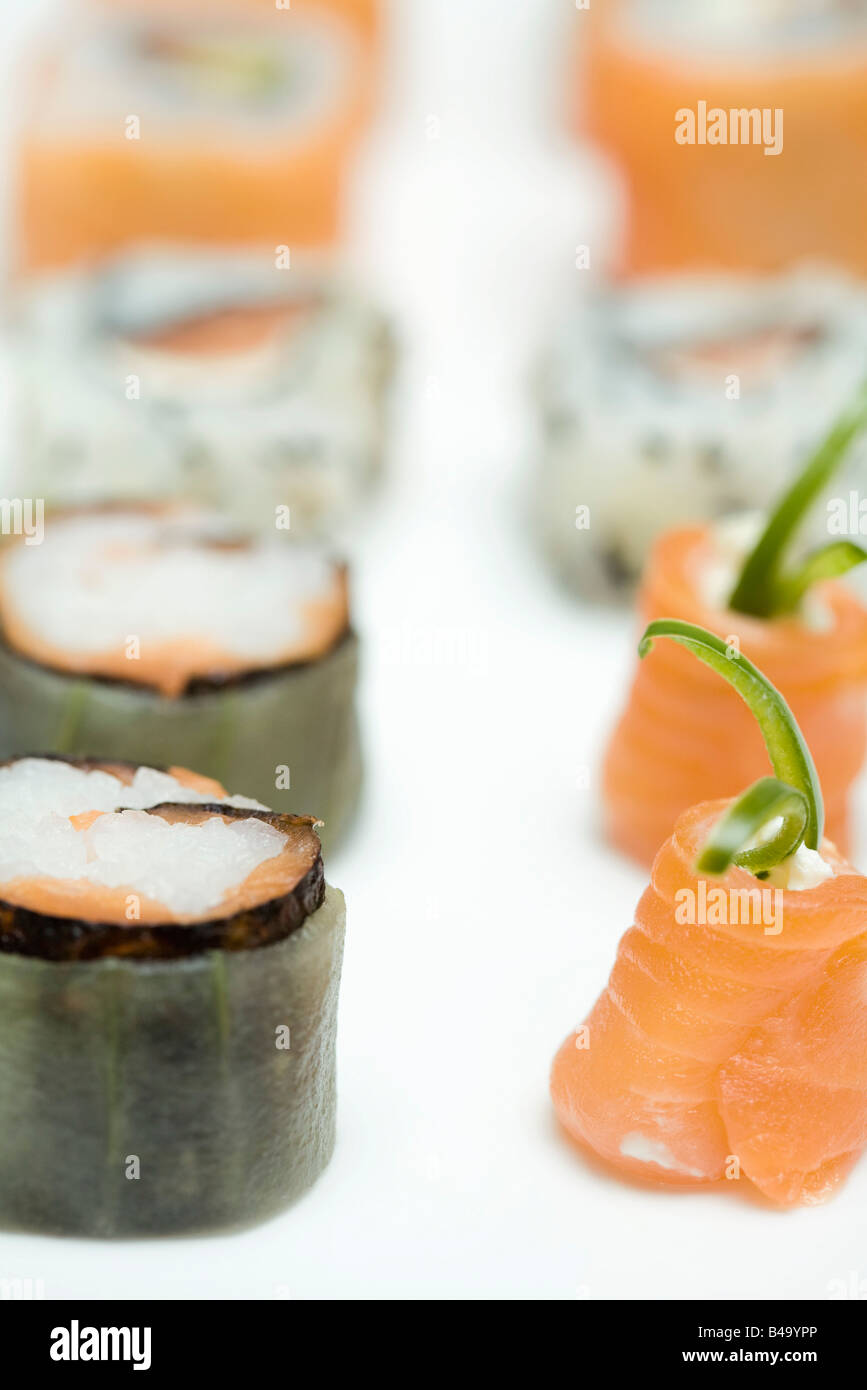 Cropped view of assorted maki sushi, close-up Stock Photo - Alamy
