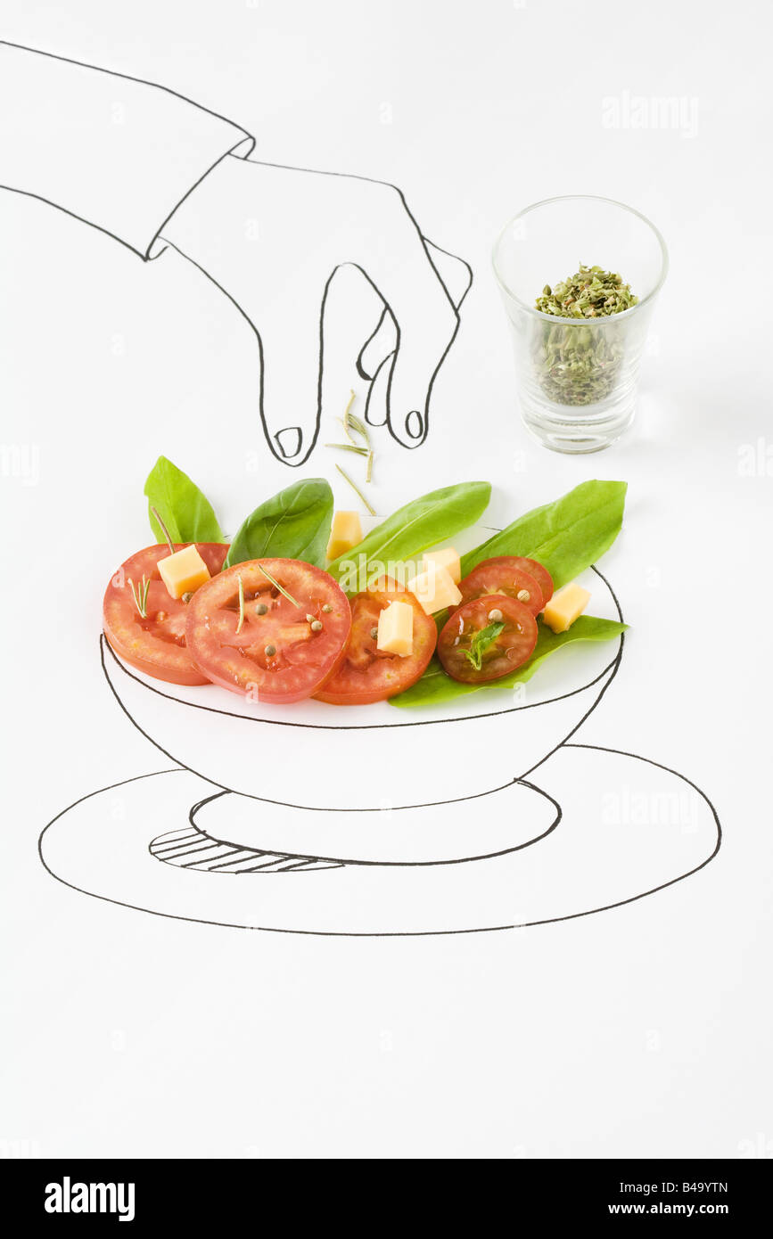 Drawing of hand sprinkling seasonings on salad Stock Photo - Alamy