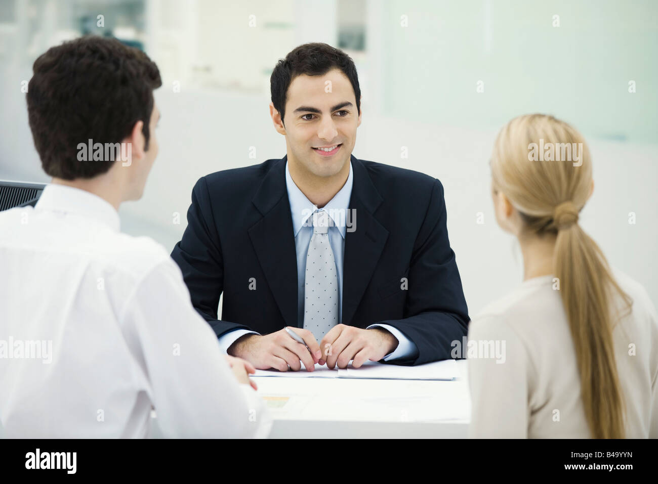 Meeting between professional and clients Stock Photo - Alamy