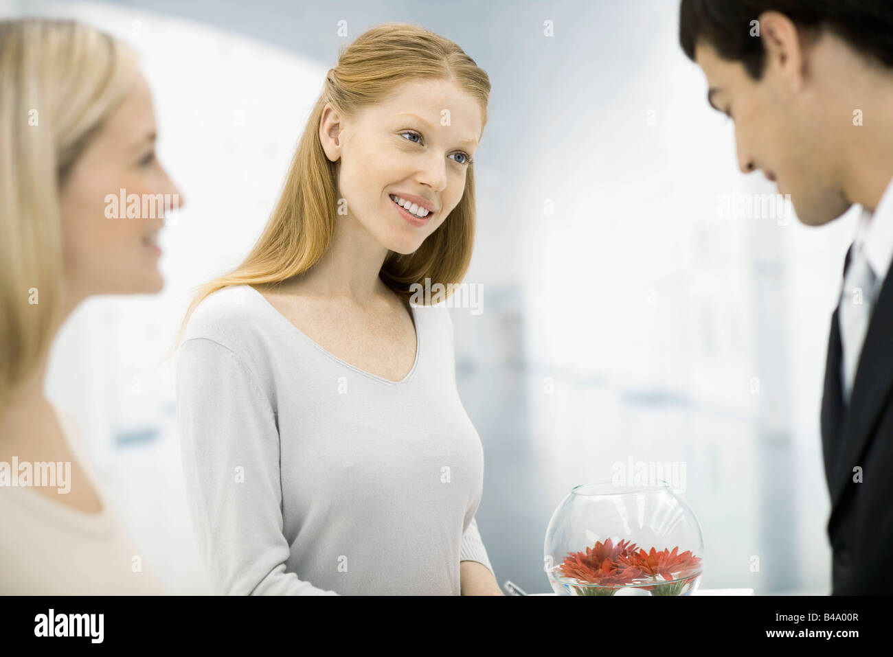 Customer service representatives collecting information from customer ...