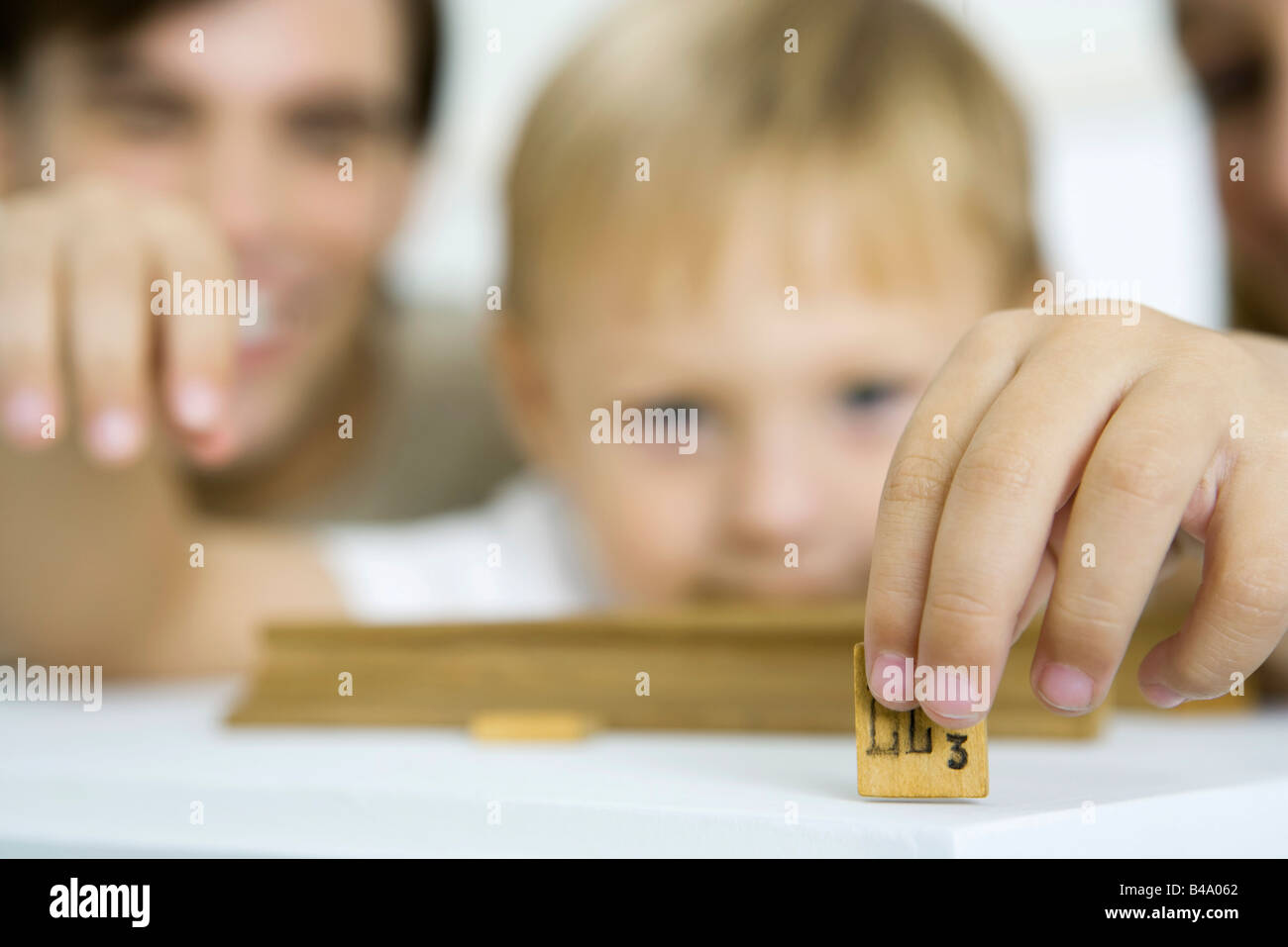 Scrabble board boy hi-res stock photography and images - Alamy