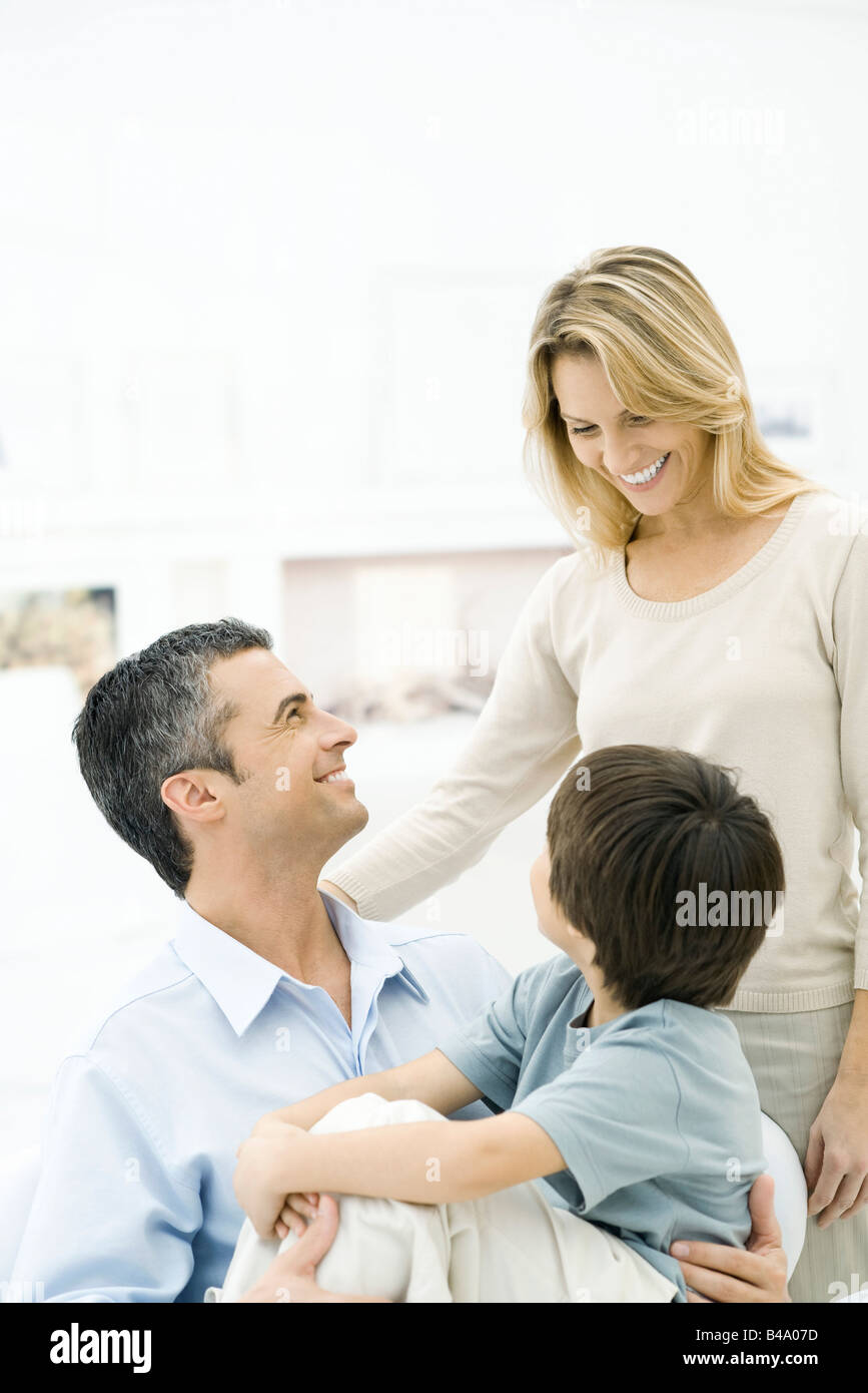 Two kids on their moms lap hi-res stock photography and images - Alamy