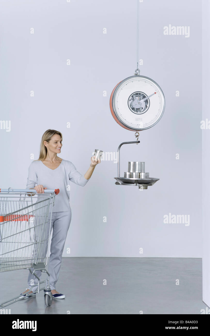 Shopping carts on scale hi-res stock photography and images - Alamy