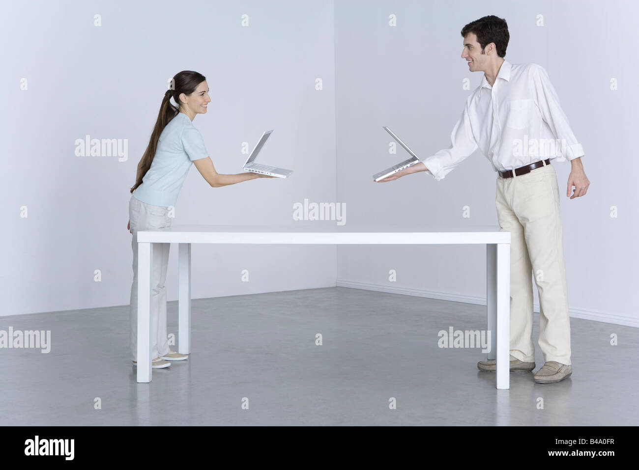 Laptops facing another laptop hi-res stock photography and images - Alamy