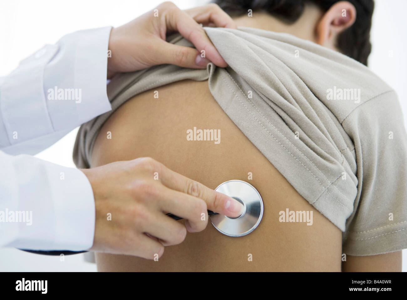 Doctor listening patients back stethoscope hi-res stock photography and ...