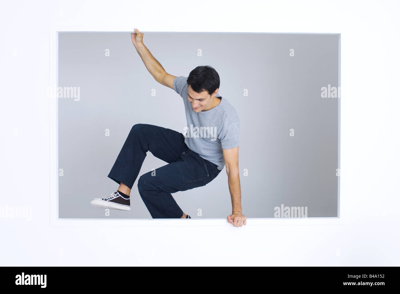 Climbing over ledge hi-res stock photography and images - Alamy