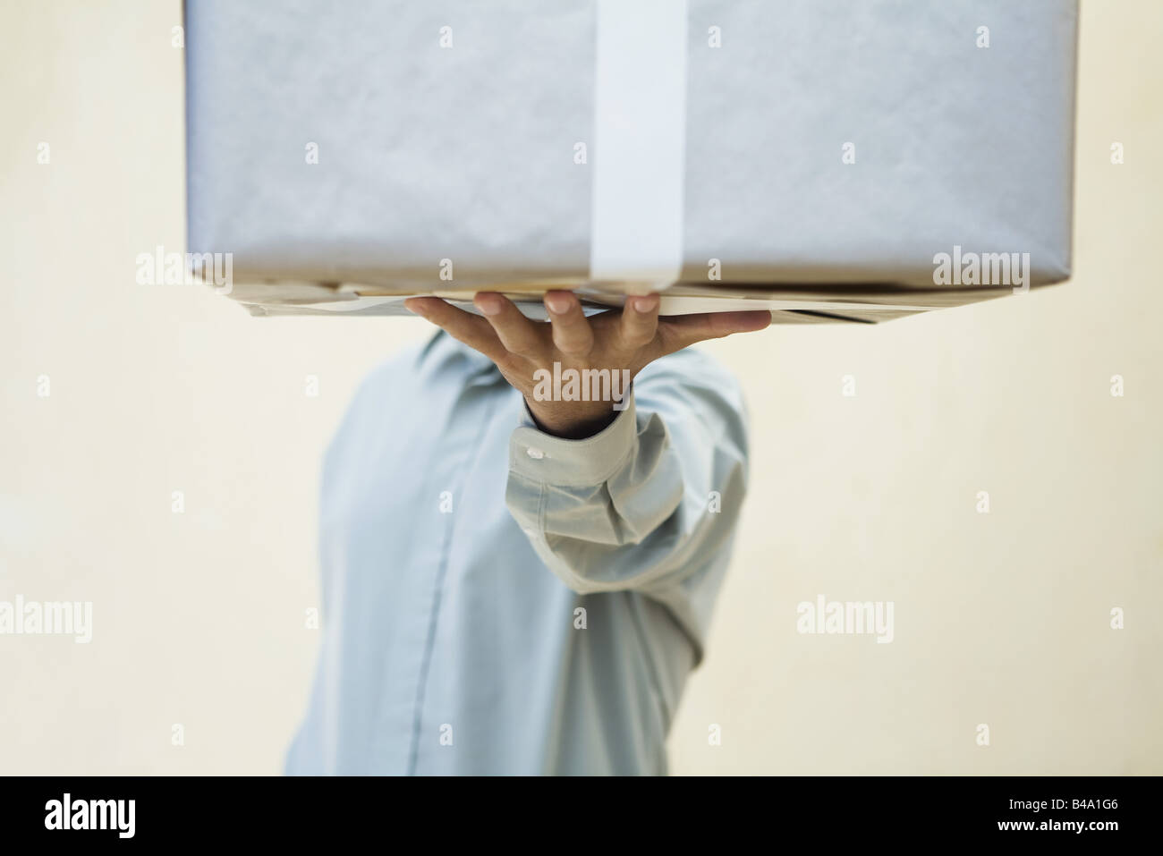 Person with hands holding large object hi-res stock photography and ...