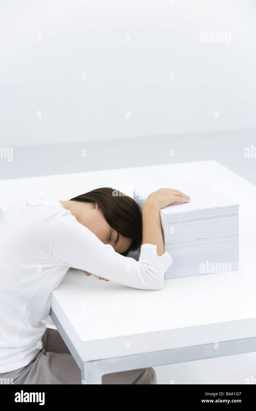 Stacks of paper on office desk overhead hi-res stock photography and ...