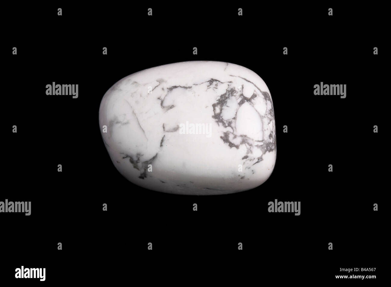 Howlite mineral specimen on black background Stock Photo - Alamy