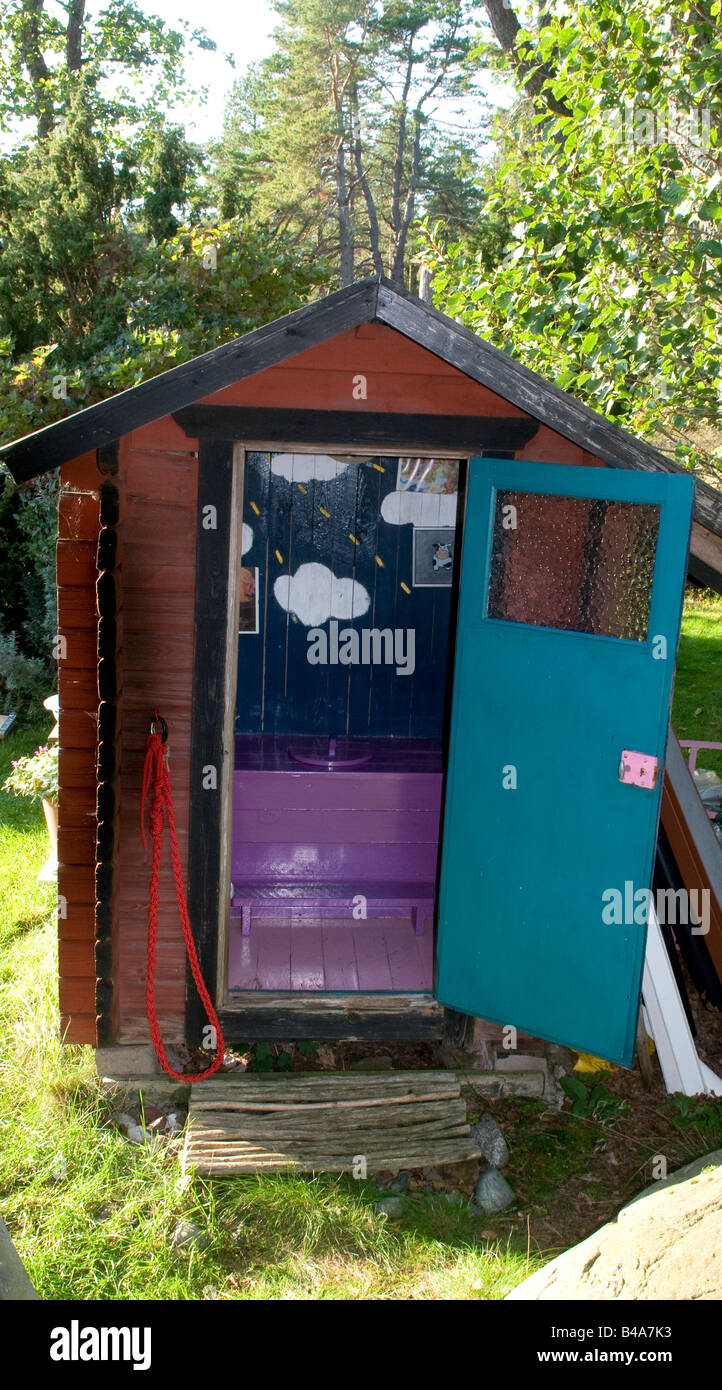 An outdoor loo, built out of wood, on an island in the Stockholm ...