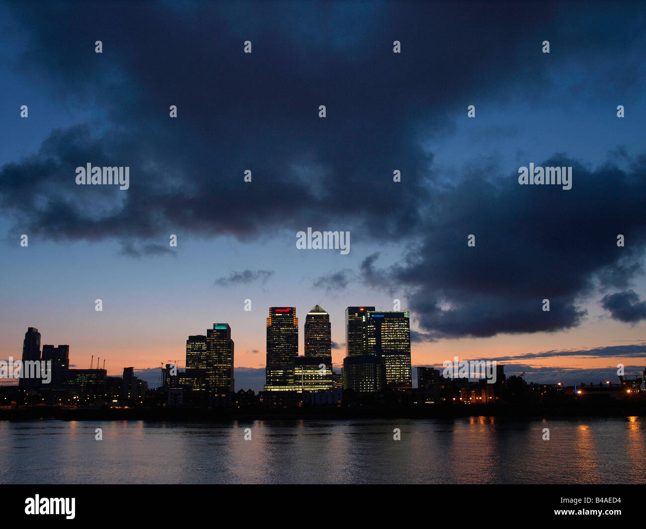 Docklands skyline at dusk with beautiful dark clouds London UK Stock ...