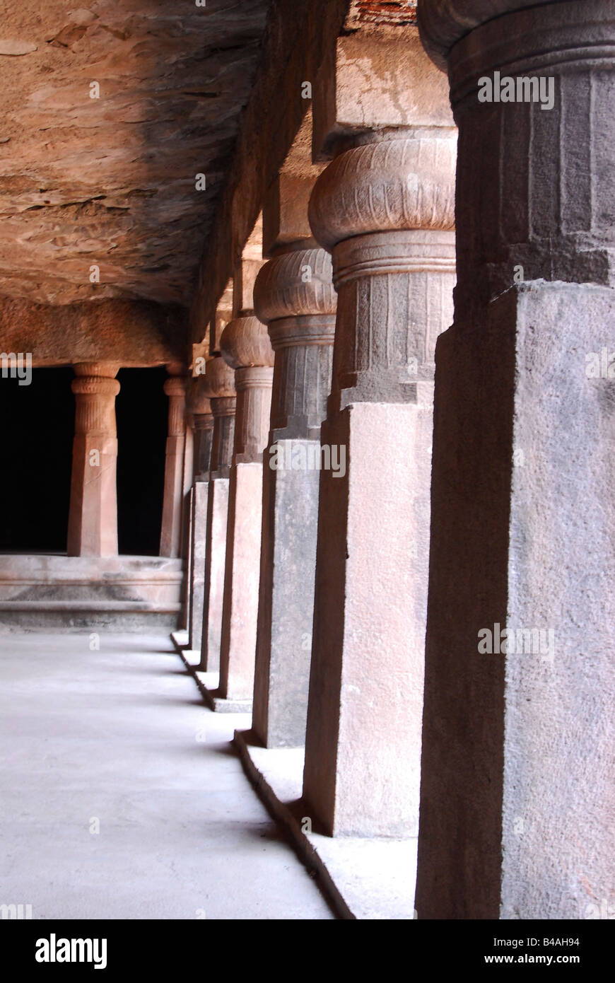 Ellora caves- stone pillar Stock Photo - Alamy