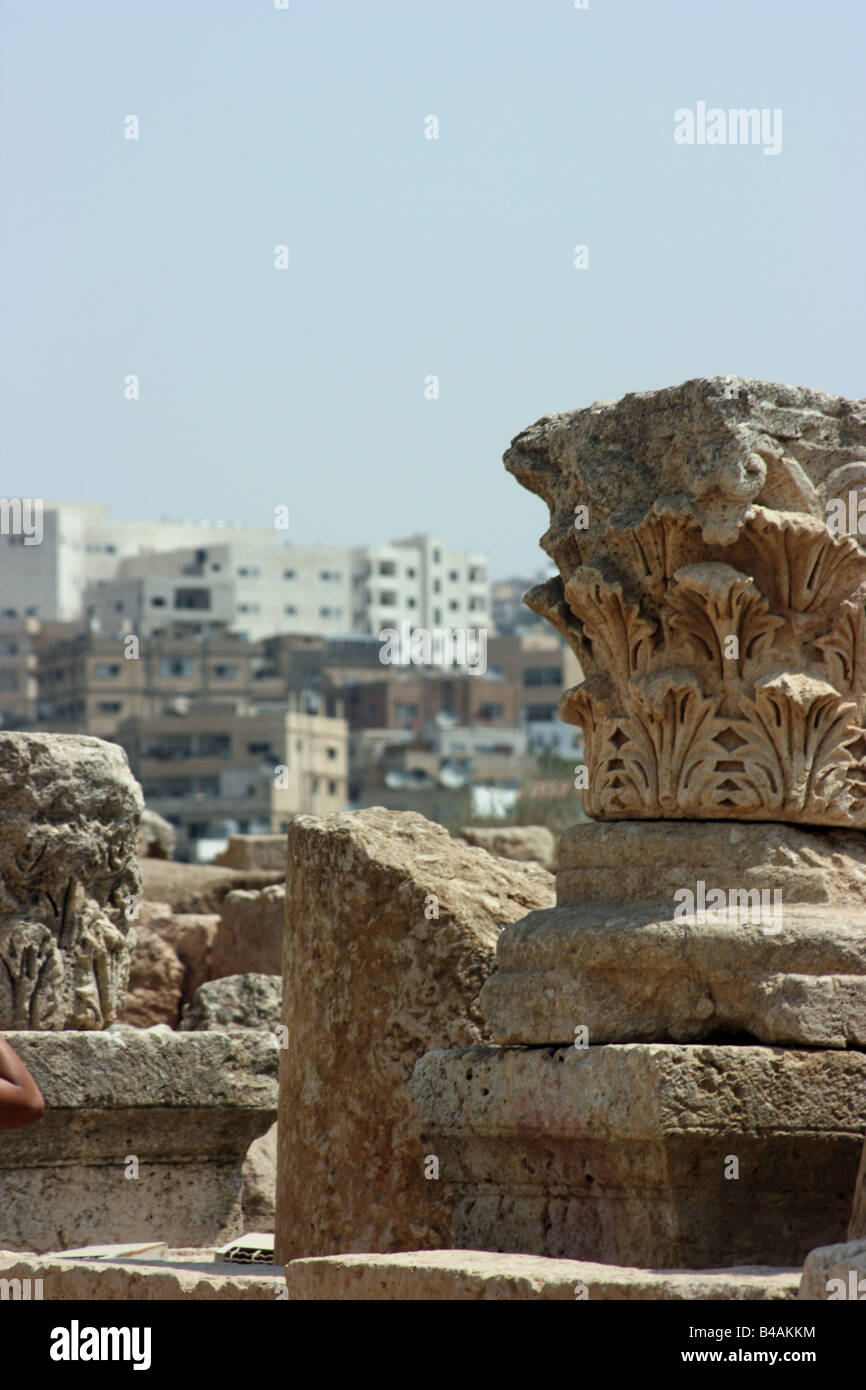 Ancient column and modern city, Jerash, Jordan Stock Photo - Alamy