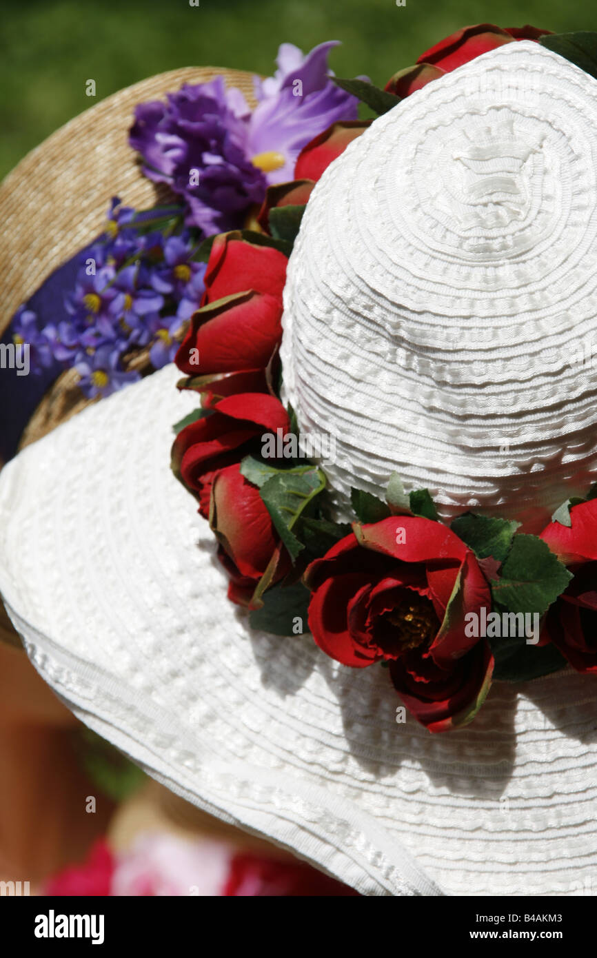 women's hats decorated with flowers in sun Stock Photo - Alamy