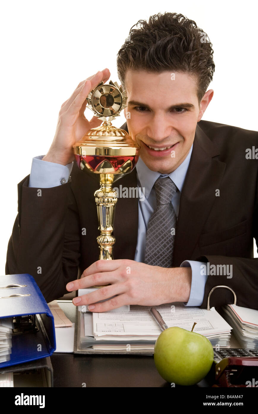Business man trophy hi-res stock photography and images - Alamy