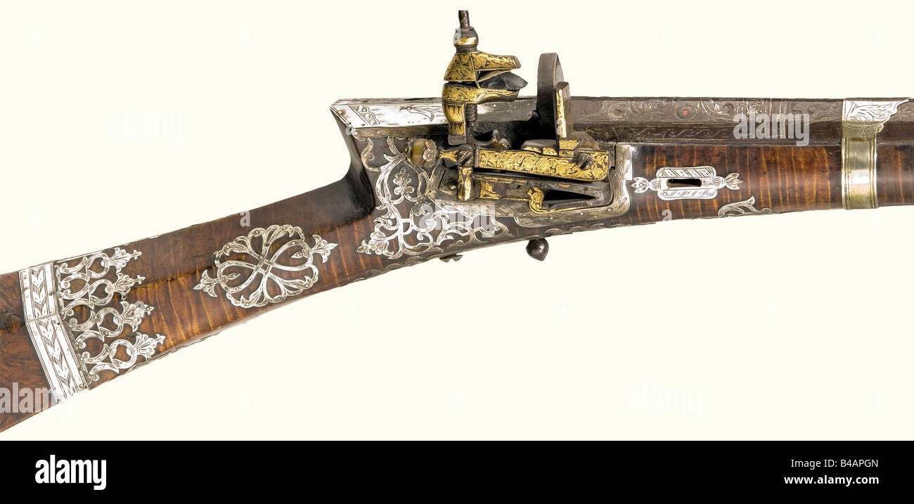 A miquelet flintlock rifle, decorated in silver, Ottoman, dated 1825 ...