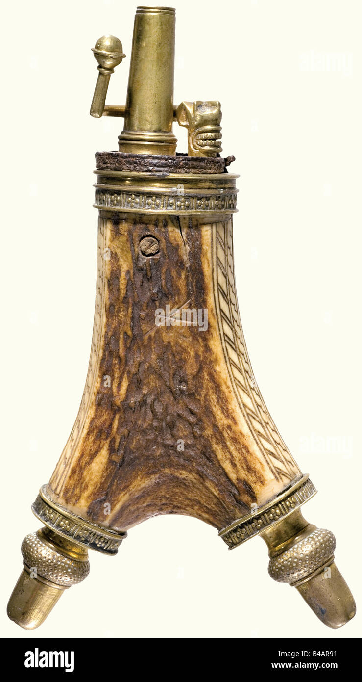 A German powder flask, circa 1580. The body is of polished staghorn ...
