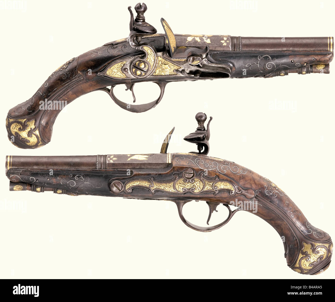 A pair of gold-inlaid flintlock traveler's pistols, France(?), circa ...