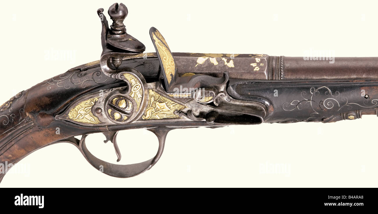 A pair of gold-inlaid flintlock traveler's pistols, France(?), circa ...