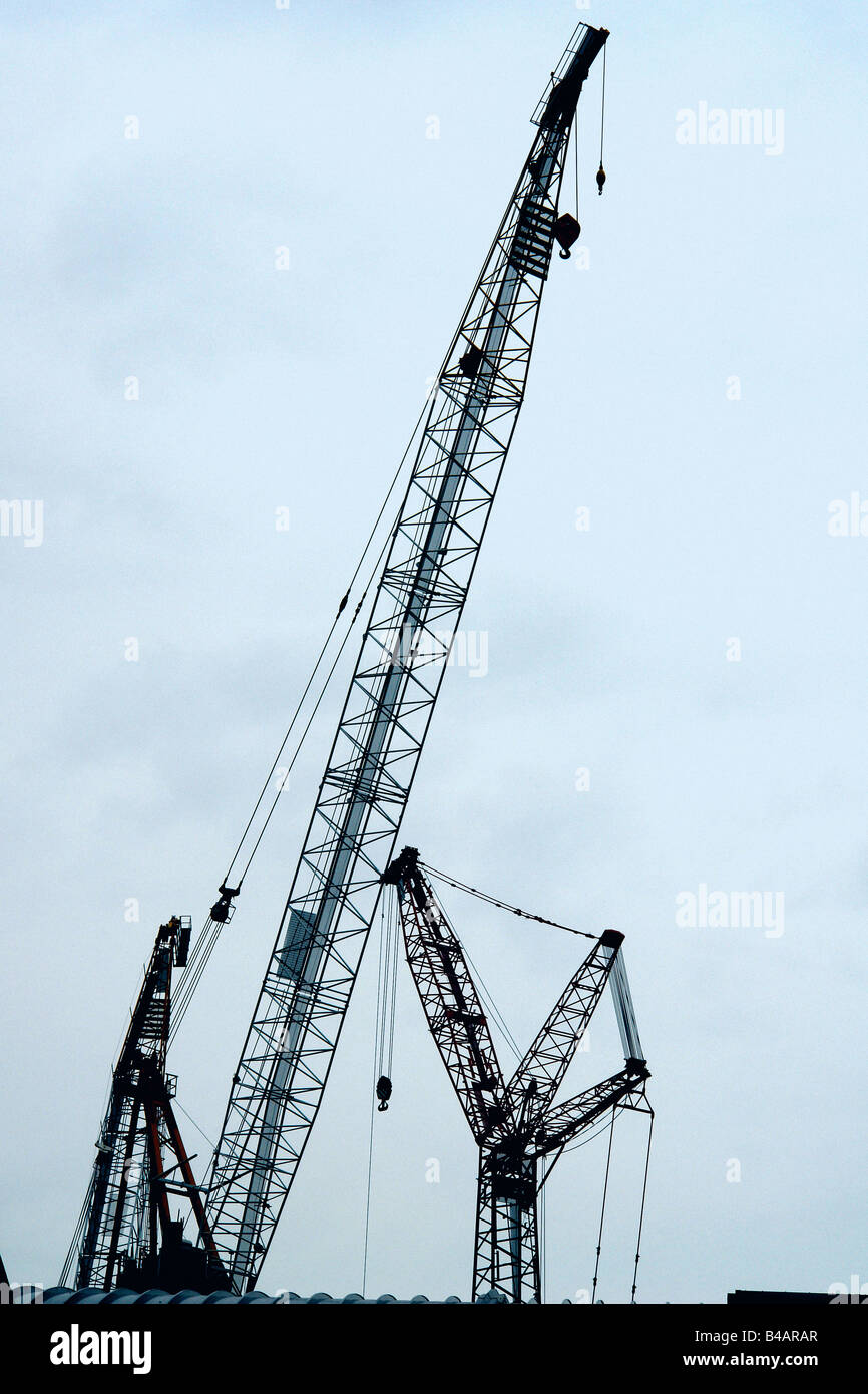 Urban Scene of Two 2 Construction Cranes at a Construction Site Viewed ...