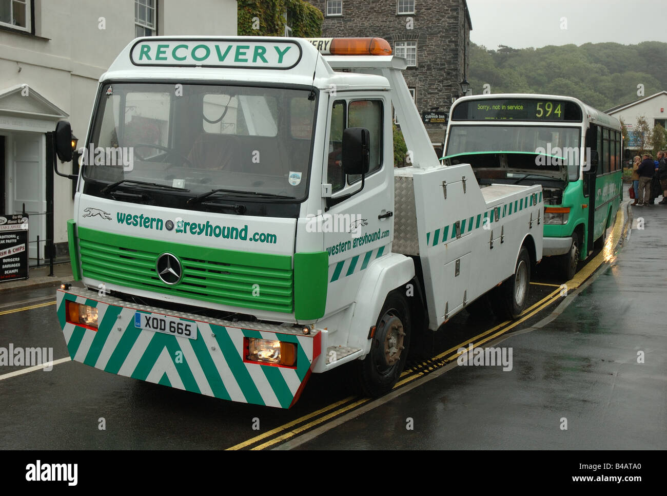 recovery vehicle and broken down bus, Boscastle, Cornwall, England, UK ...