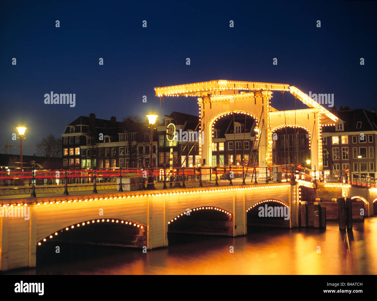 Amsterdam city night time illuminated hi-res stock photography and ...