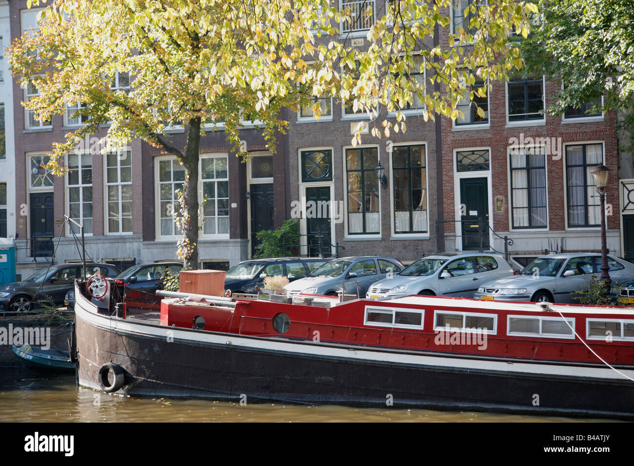 Canal and boat, Amsterdam, Netherlands Stock Photo - Alamy