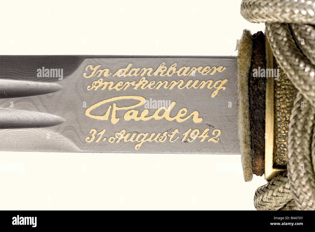 A naval honour dagger, complete with sword knot and hanger. Blade bears ...