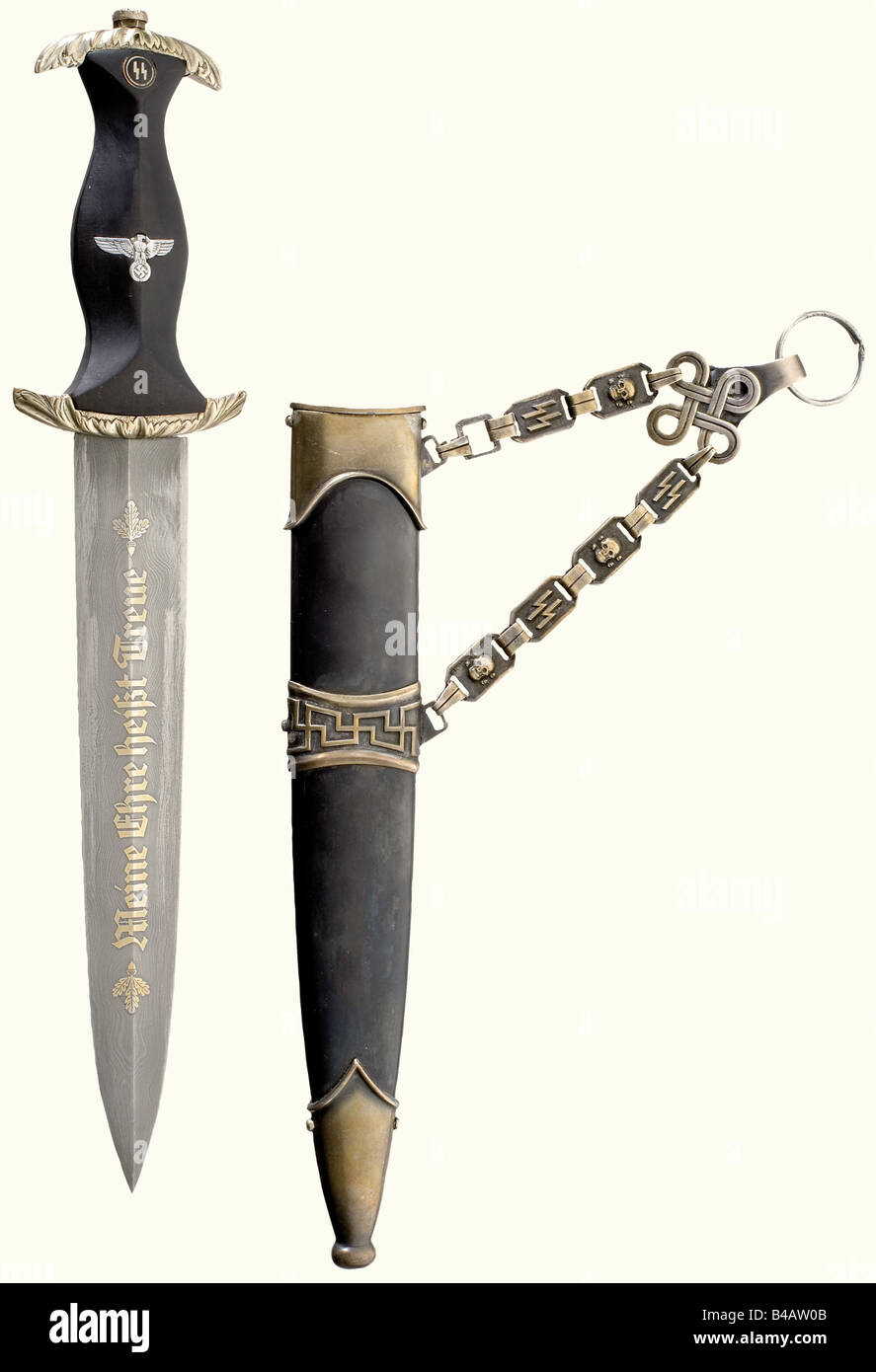 An SS honour dagger., Blade with the gilded etching of the motto, and ...