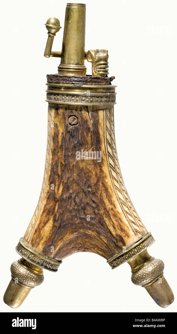 A German powder flask, circa 1580. The body is of polished staghorn ...