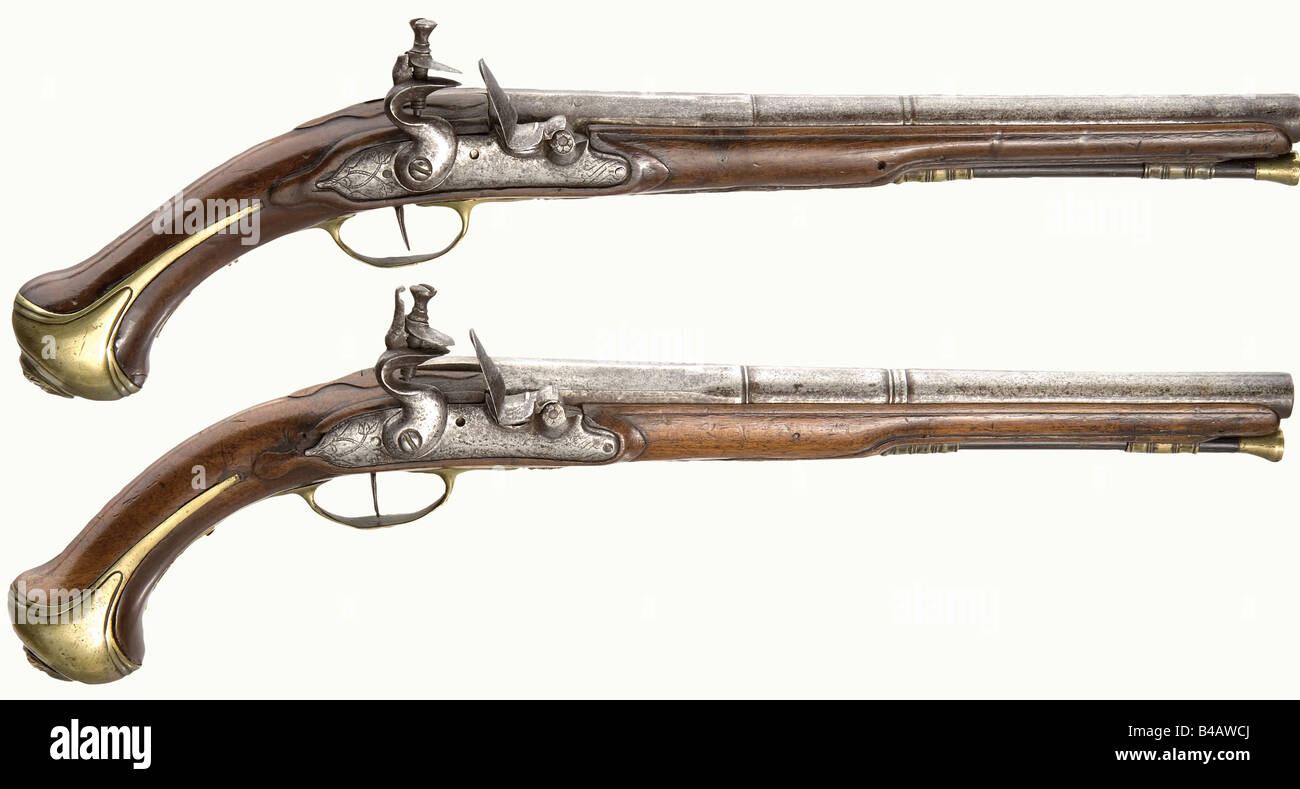 A pair of flintlock pistols with interior frizzen springs, France ...