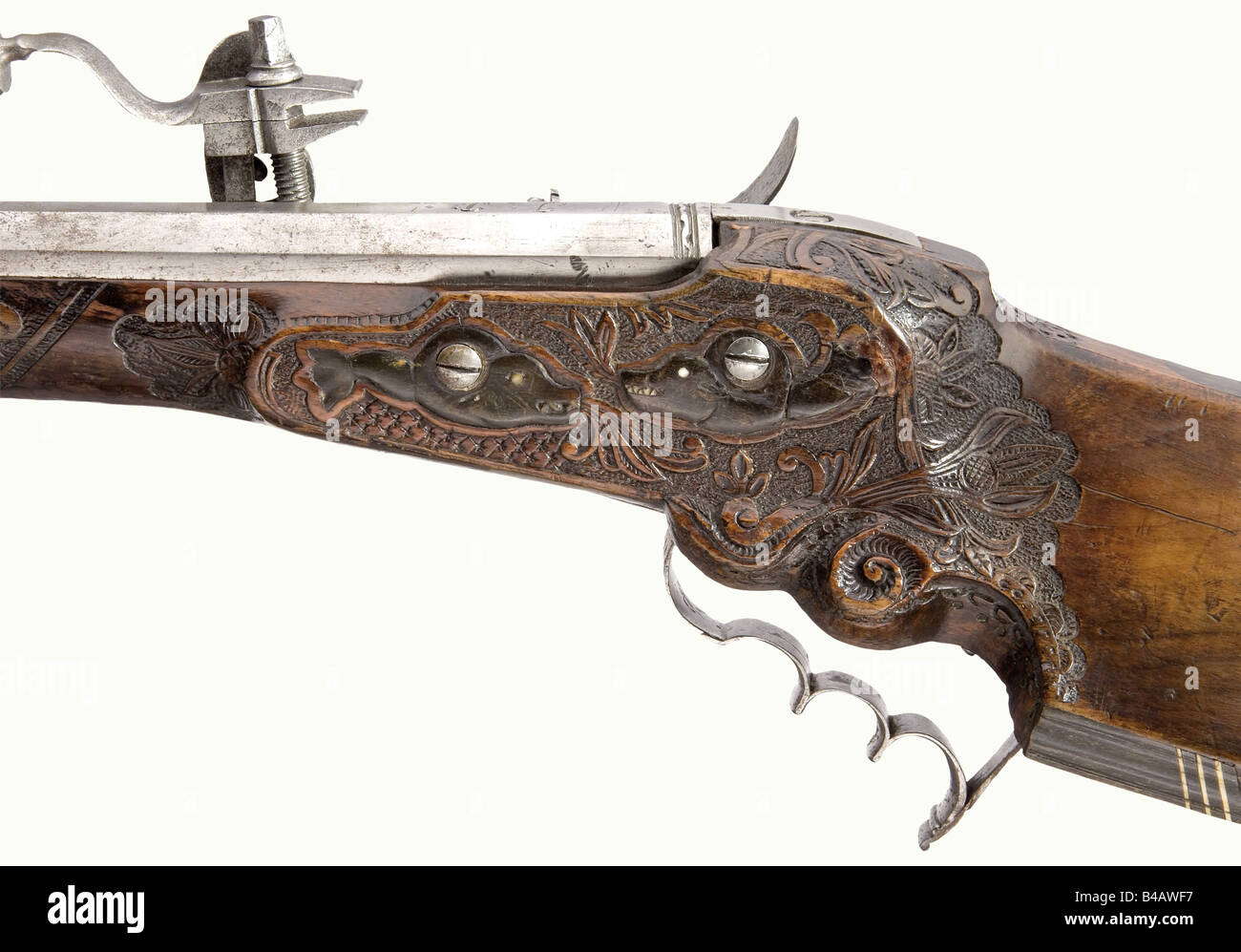 A wheellock rifle, German, circa 1680. Octagonal, slightly swamped ...