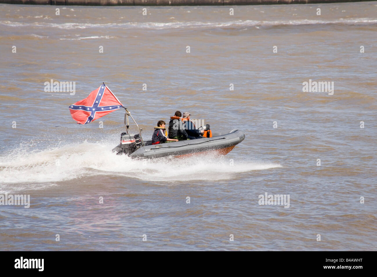 Small speedboat sailing up the Mersey during the Tall Ships Race Parade ...