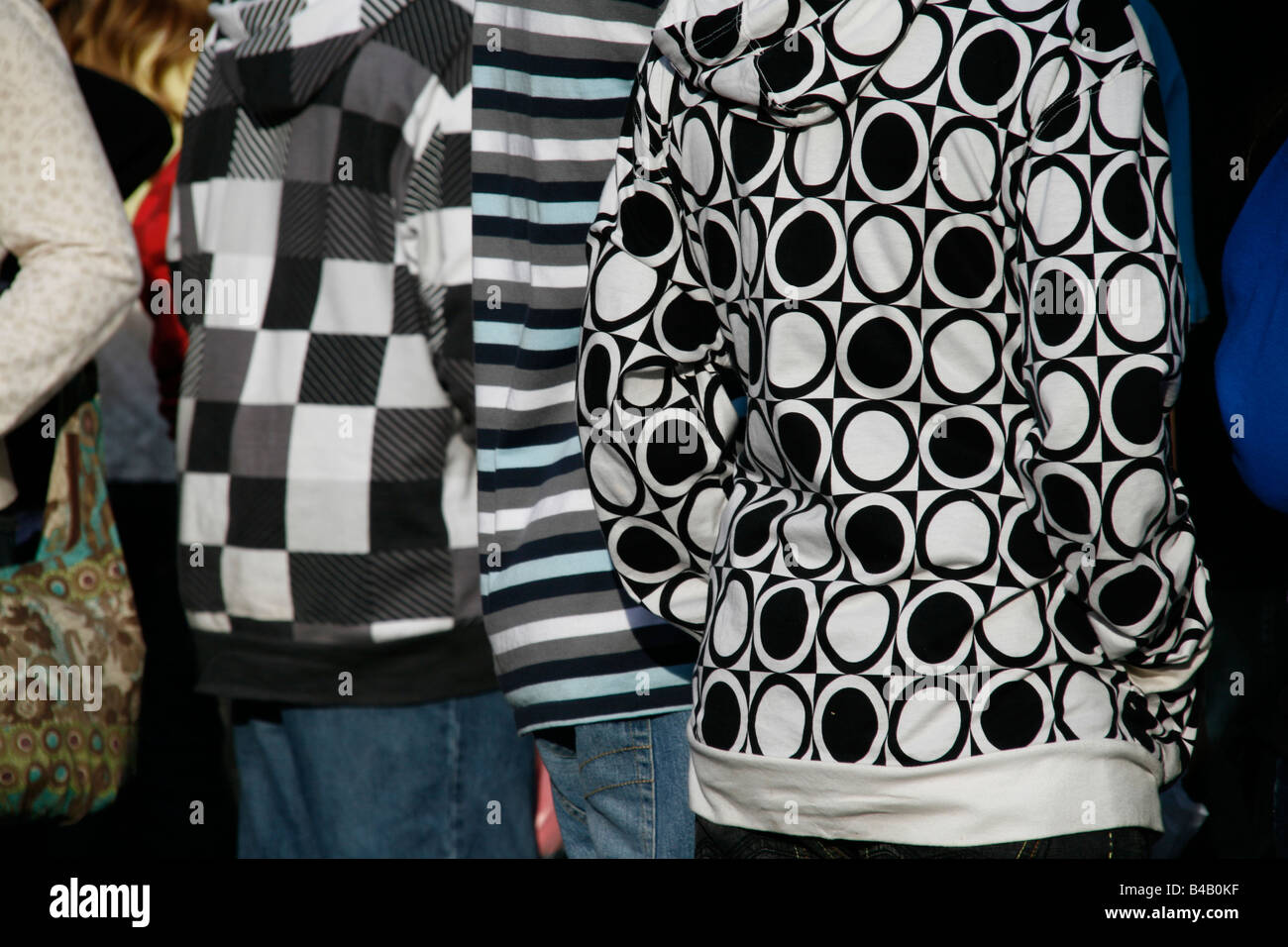 group young men friends wearing graphic designer jumpers Stock Photo ...