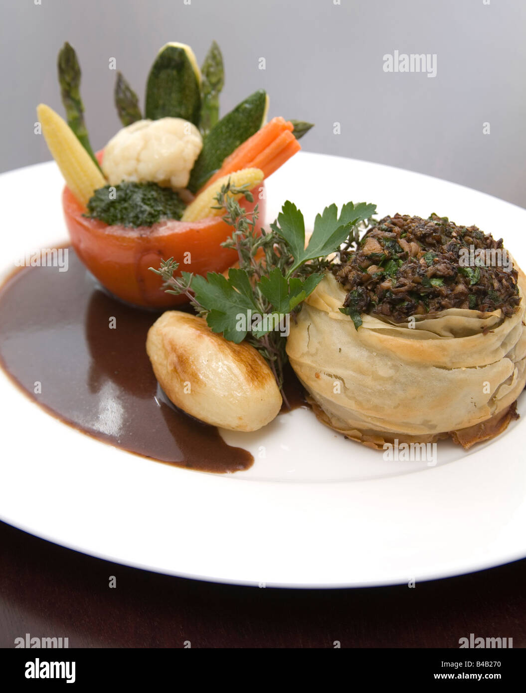 Minced beef parcel with potatoes and vegetables Stock Photo - Alamy
