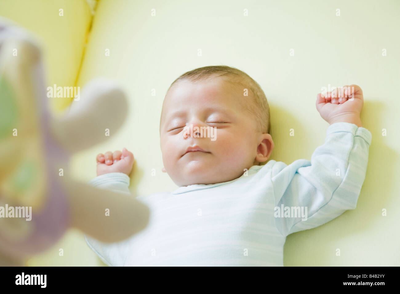 cute infant sleep in bed Stock Photo - Alamy