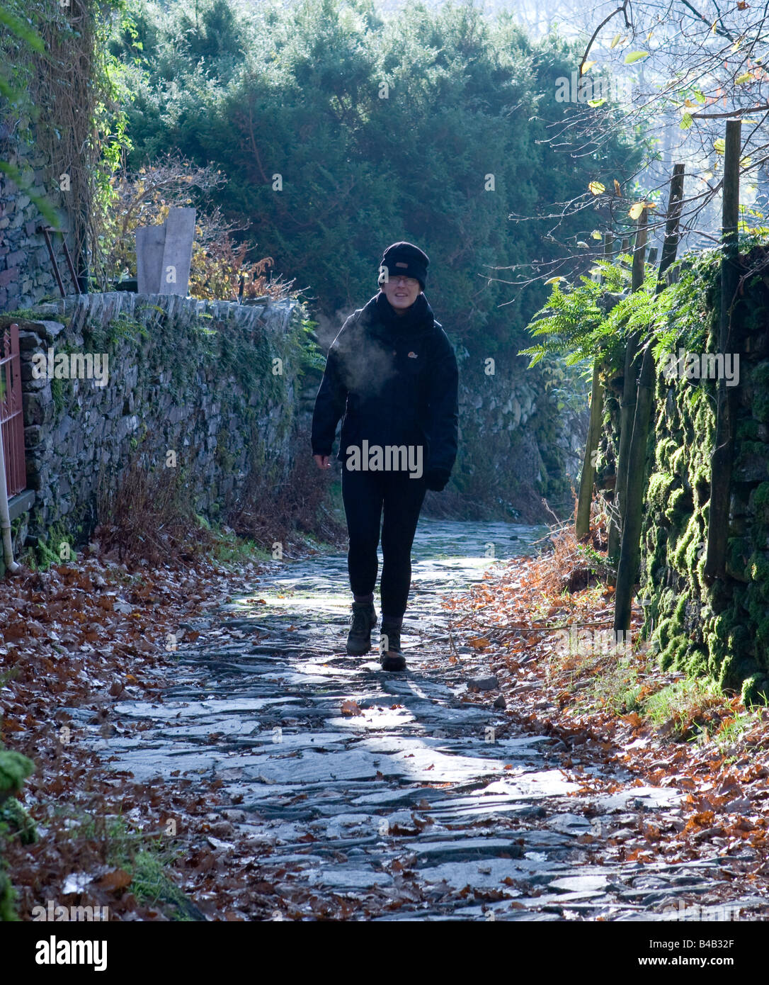 Woman and brisk walking outdoors hi-res stock photography and images ...