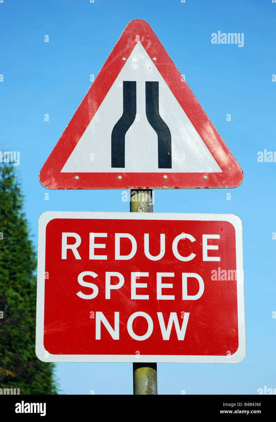 Reduce speed sign hi-res stock photography and images - Alamy