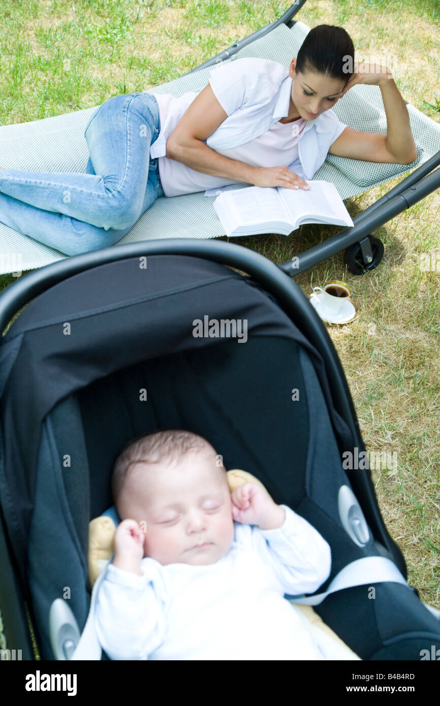 Boy girl sleeping in grass hi-res stock photography and images - Alamy