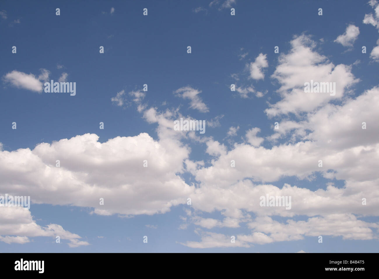 Bright white clouds and blue sky Stock Photo - Alamy