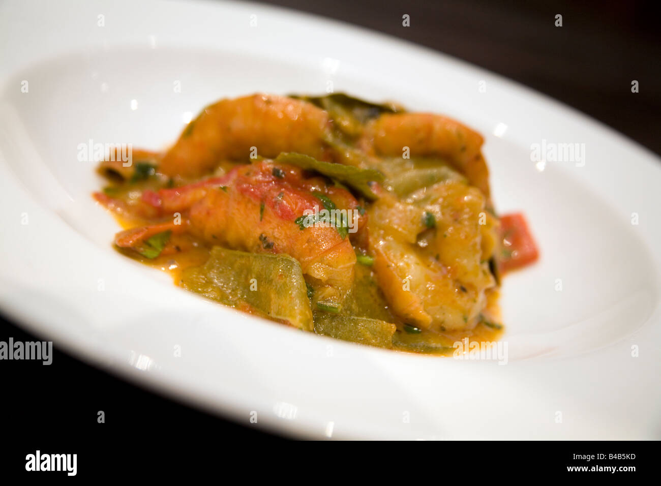 Malaysian prawn red curry Stock Photo - Alamy