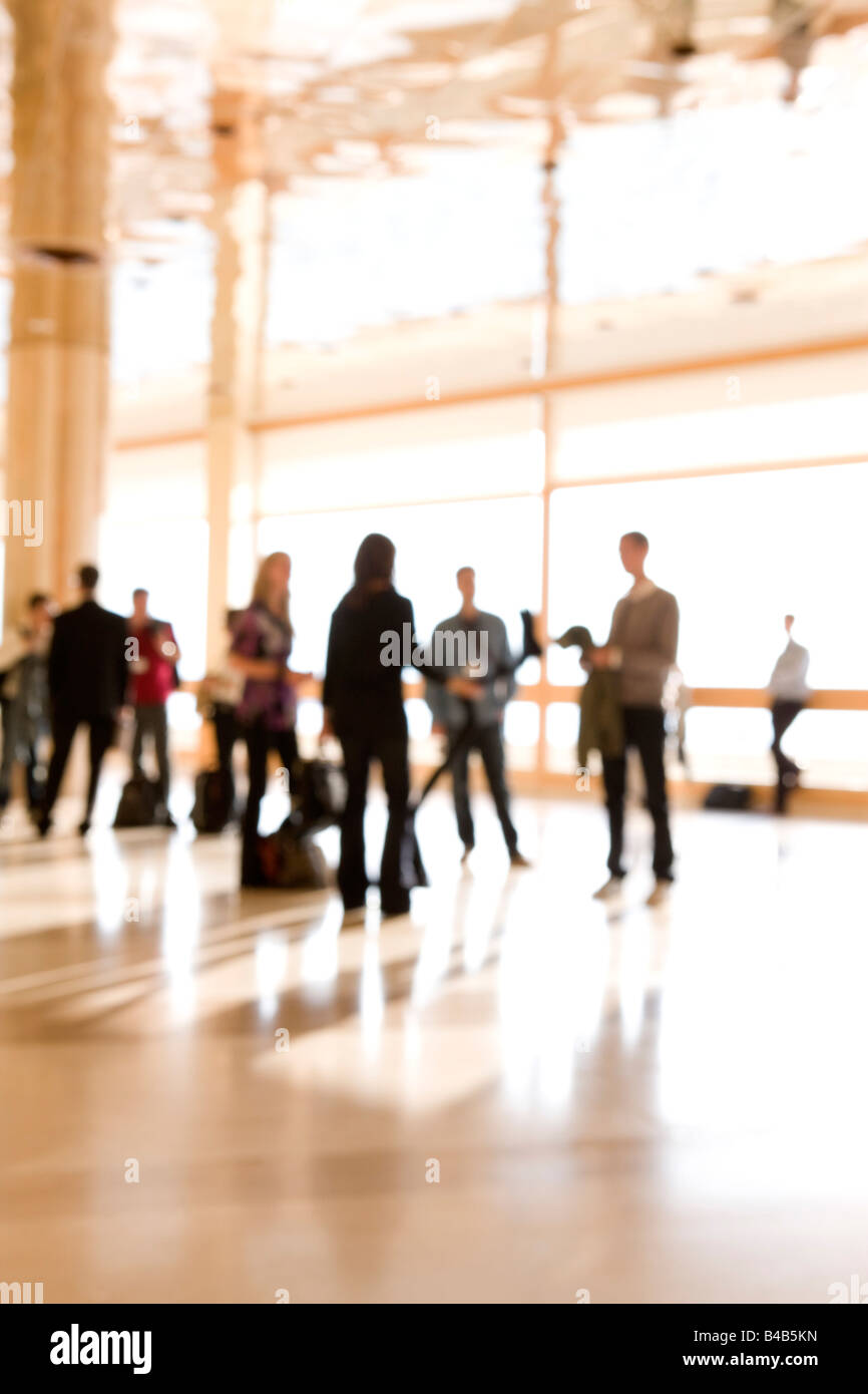 group of people waiting Stock Photo - Alamy