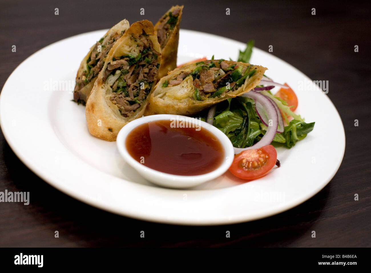 Roasted duck rolls Stock Photo - Alamy
