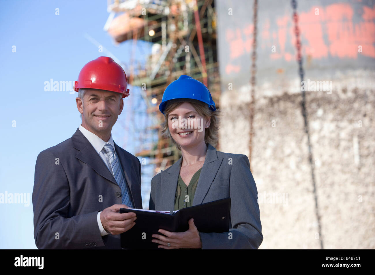 Two construction engineers on survey Stock Photo - Alamy
